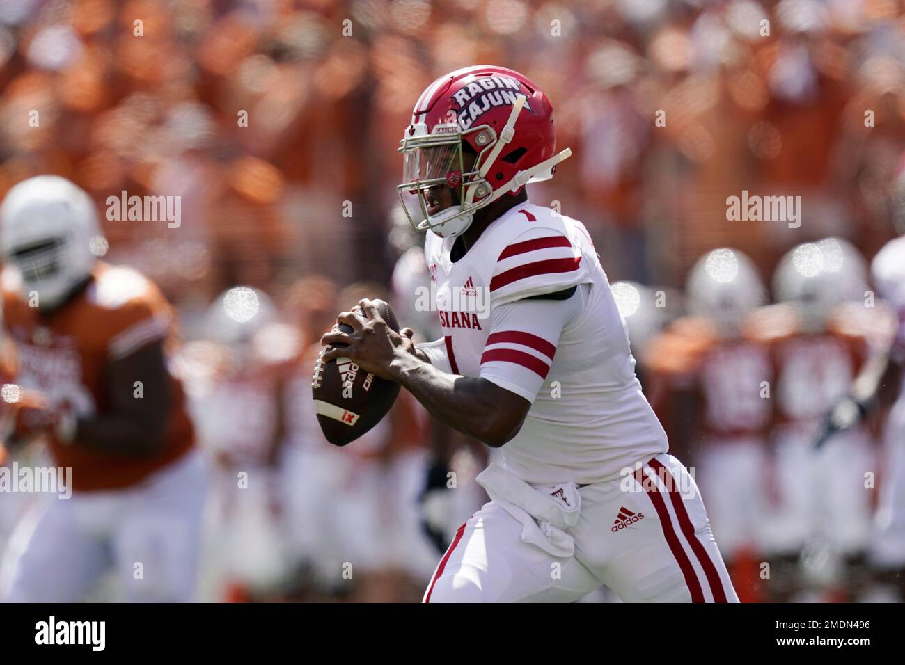 Louisiana-Lafayette quarterback Levi Lewis (1) looks to throw against ...