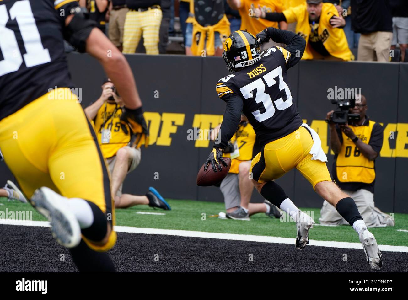 Iowa defensive back Riley Moss (33) celebrates after returning an ...