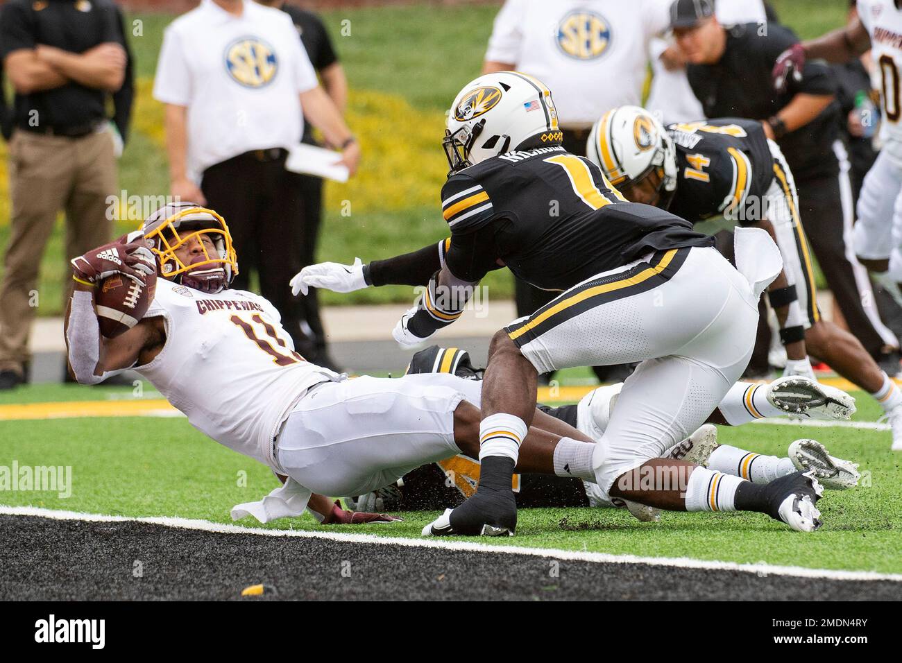 Central Michigan wide receiver JaCorey Sullivan, left, scores a ...