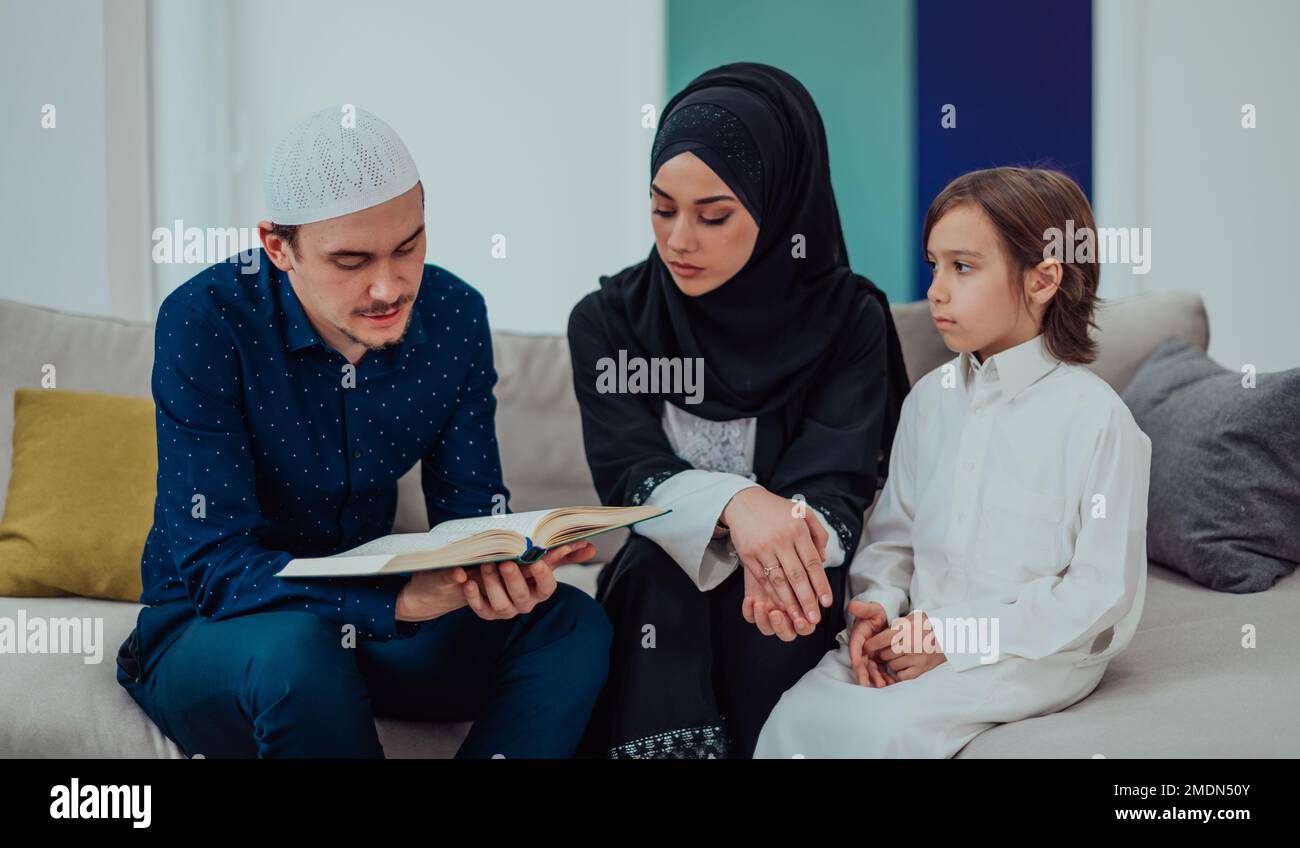 Happy Muslim family enjoying the holy month of Ramadan while praying ...
