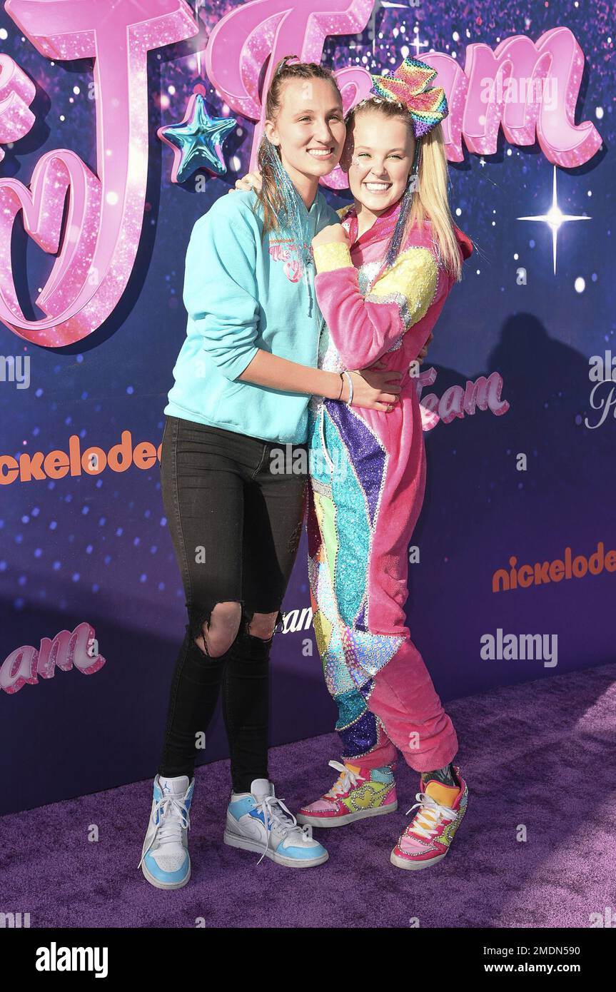 Kylie Prew, left, and JoJo Siwa arrive at the drive-in premiere of JoJo ...