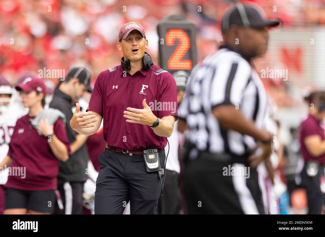 Fordham head coach Joe Conlin speaks to a game official following a ...