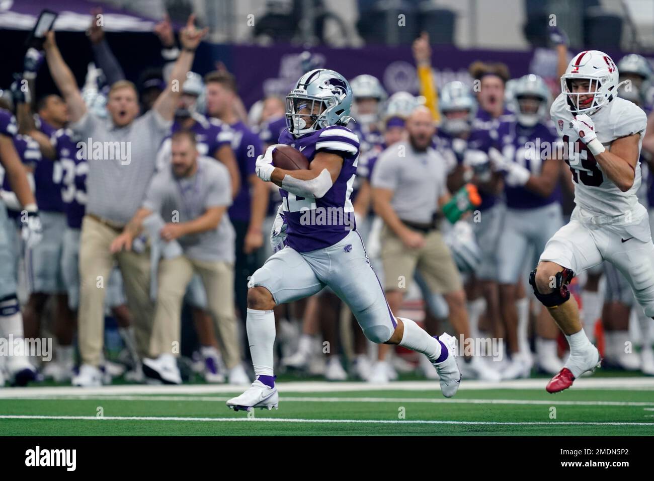 Kansas State running back Deuce Vaughn (22) sprints past Stanford ...