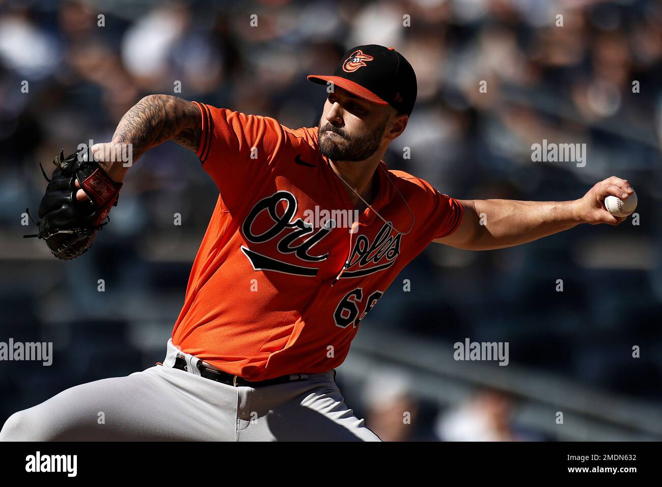Baltimore Orioles pitcher Tanner Scott (66) delivers a pitch to the New ...