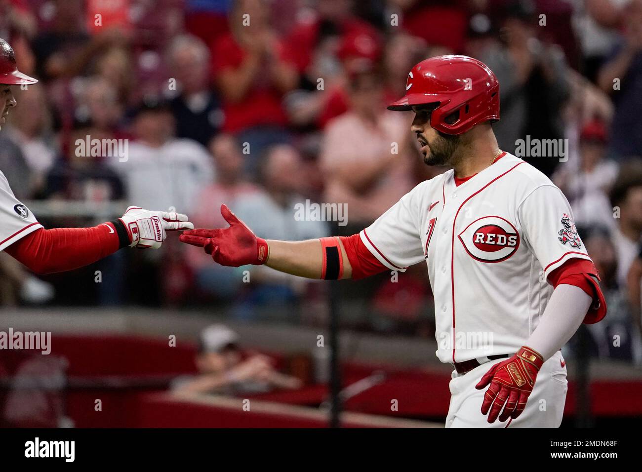 Cincinnati Reds' Eugenio Suarez (7) celebrates after hitting a solo ...