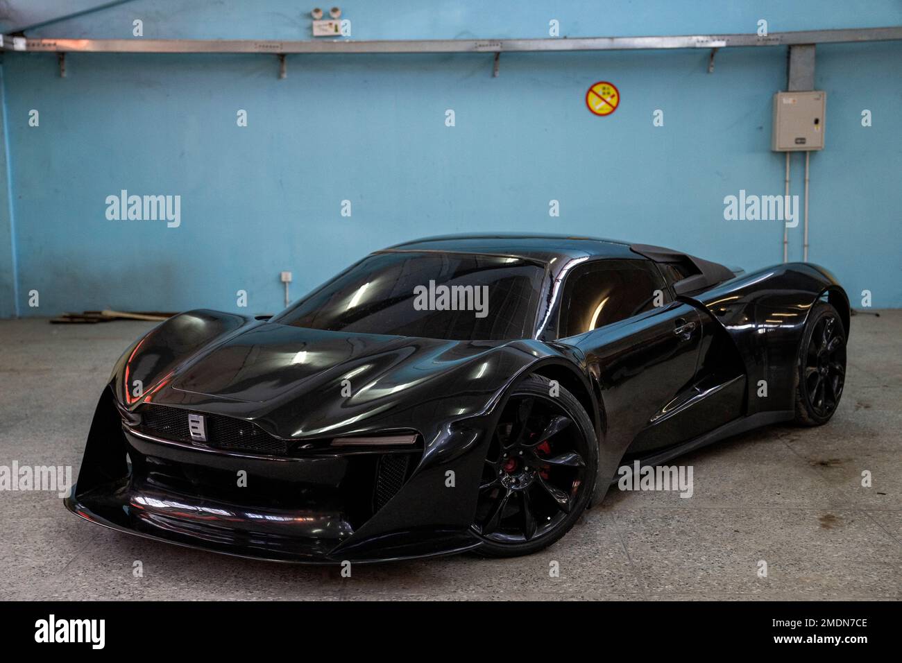 A first Afghan made sports car is seen inside the Entop car studio in ...