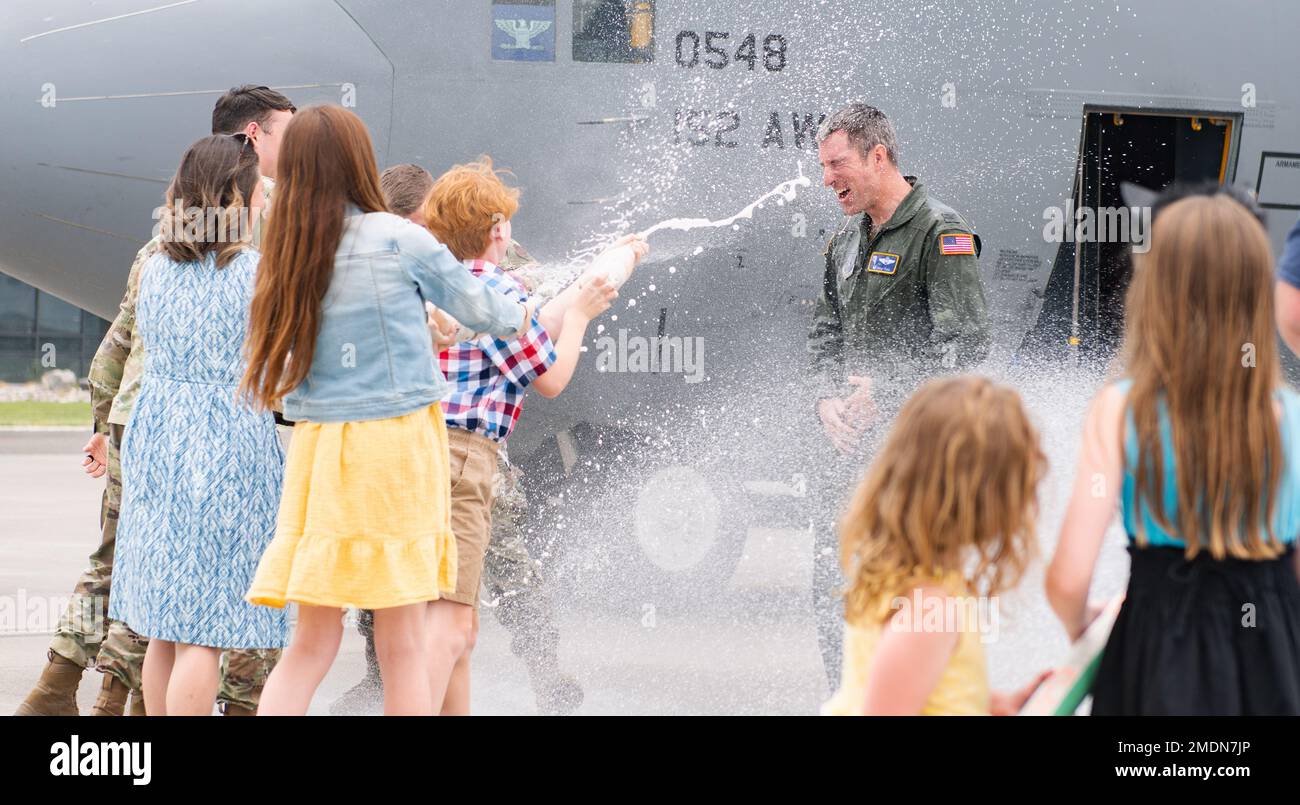 Col. Jeremy Ford, 152nd Airlift Wing commander, gets sprayed with water ...