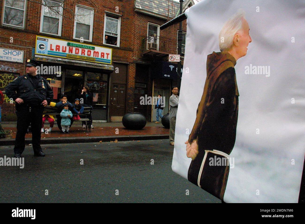 FILE - In this Sunday, March 3, 2002 file photo, a banner printed with ...