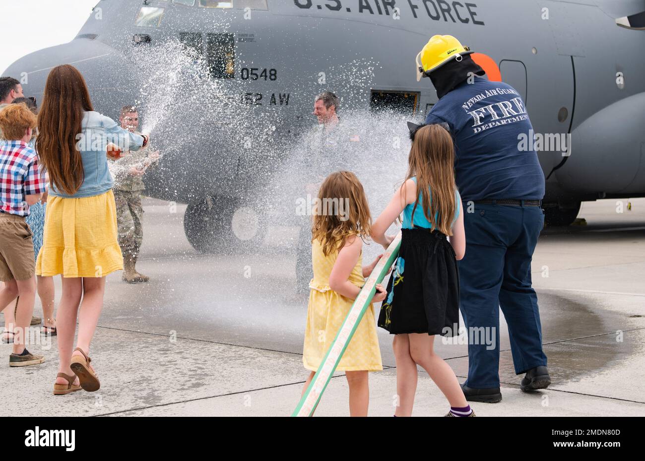 Colonel Jeremy Ford, 152nd Airlift Wing commander, gets sprayed with ...