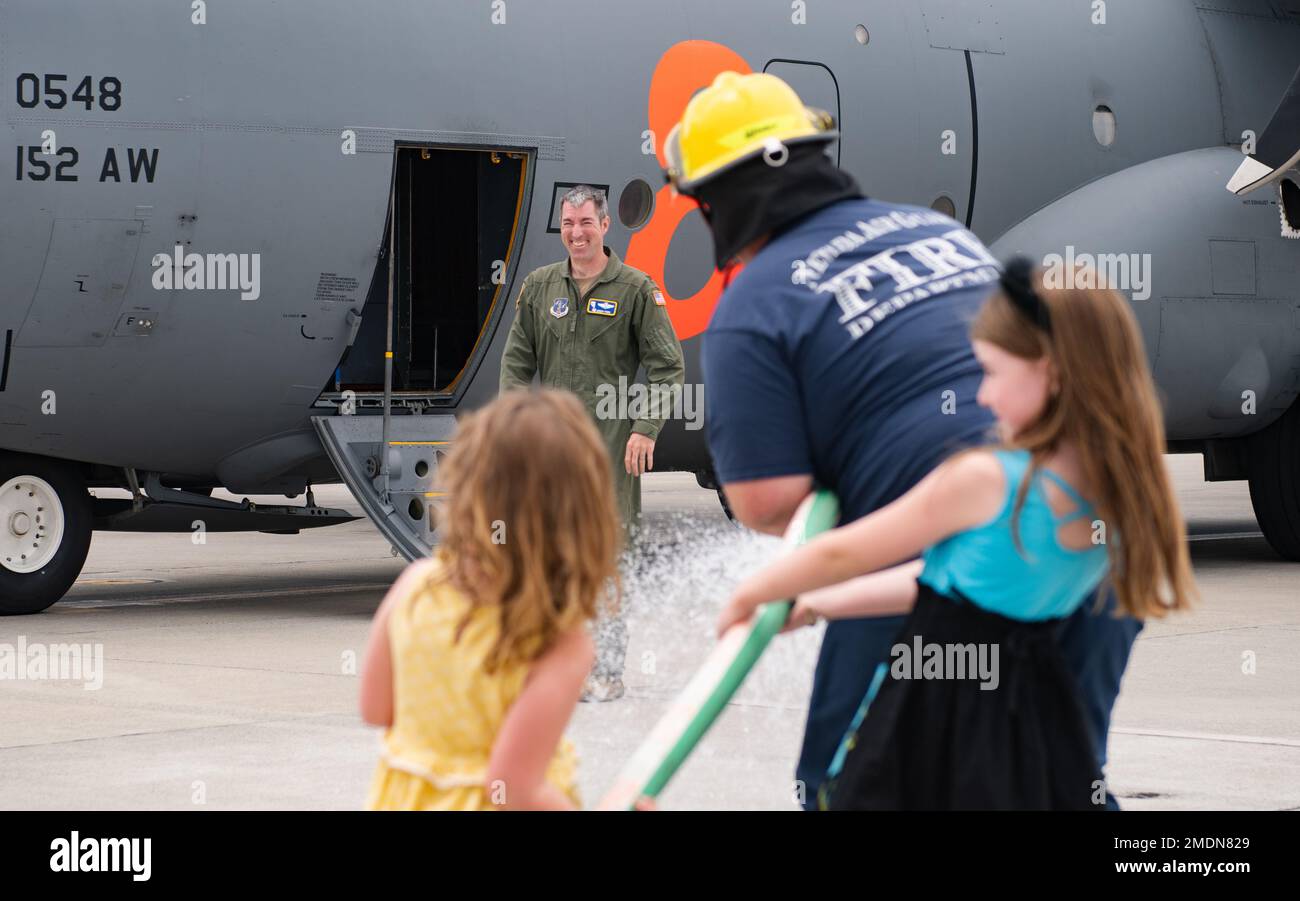 Colonel Jeremy Ford, 152nd Airlift Wing commander, gets sprayed with ...