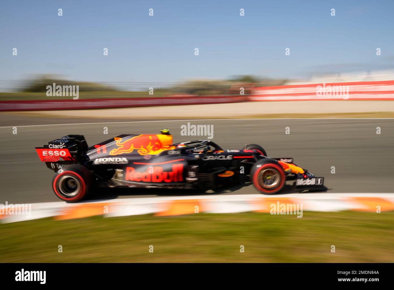 Red Bull driver Sergio Perez of Mexico steers his car during the third free practice session ...