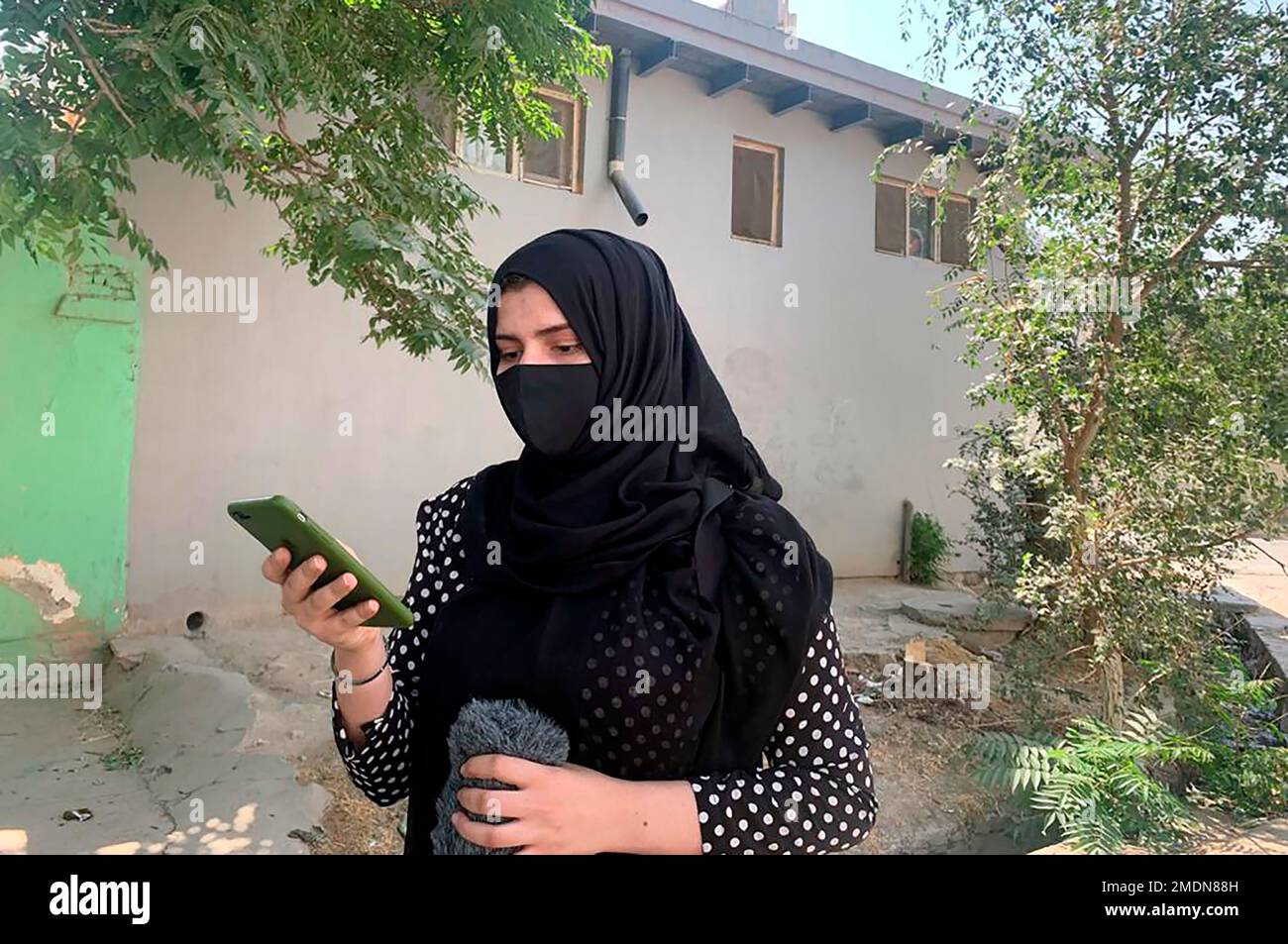 Farhat Popalzai, a Women's rights activist speaks during an interview ...