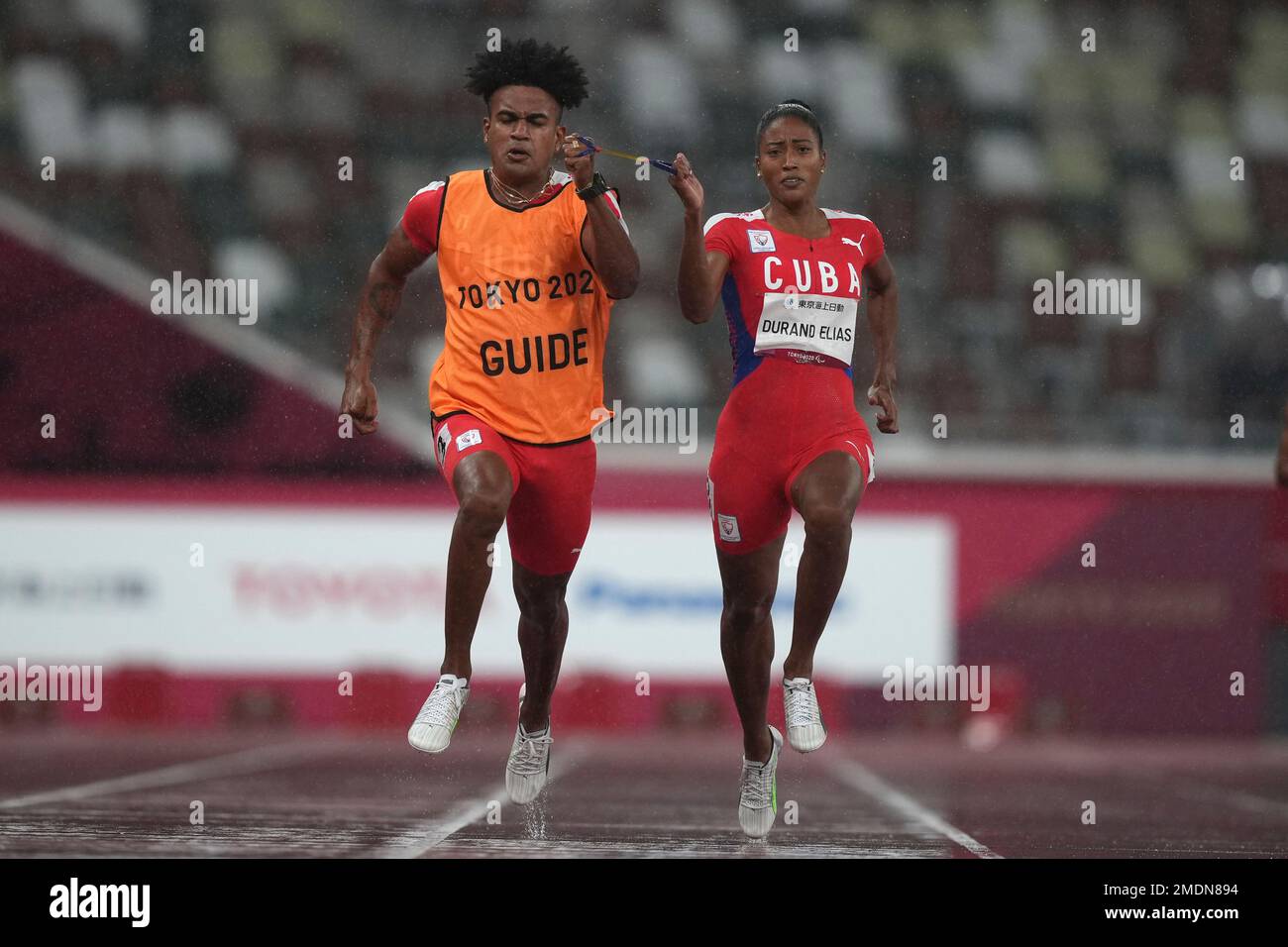 Cuba's Omara Durand Elias, right, and her guide Yuniol Kindelan Vargas ...