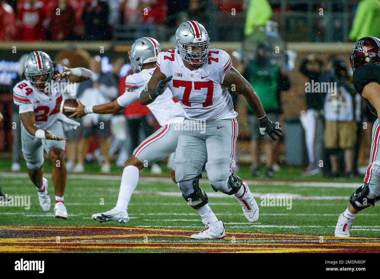 Ohio State offensive lineman Paris Johnson Jr. (77) blocks against ...