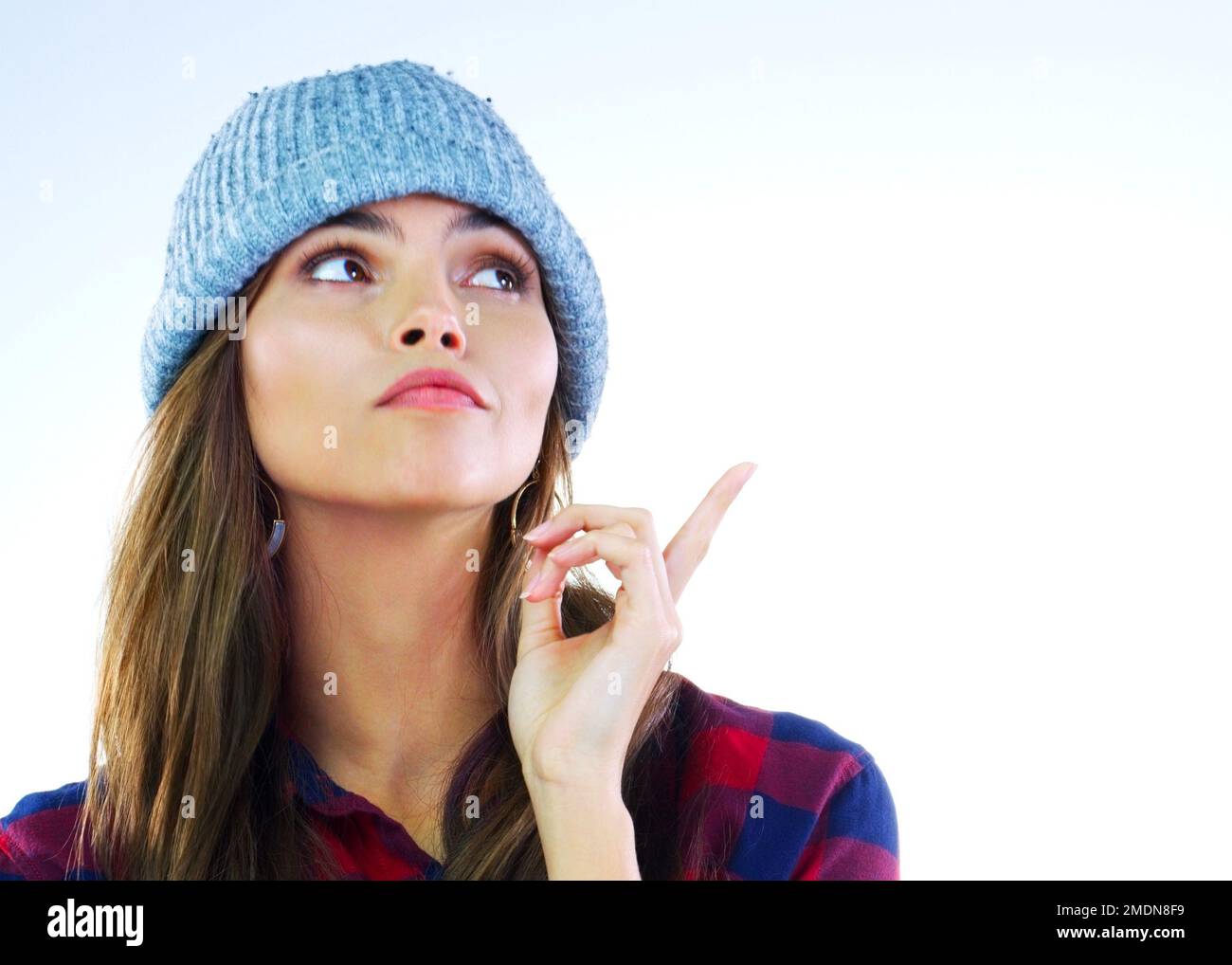 I have something on my mind...a young woman pointing at something ...