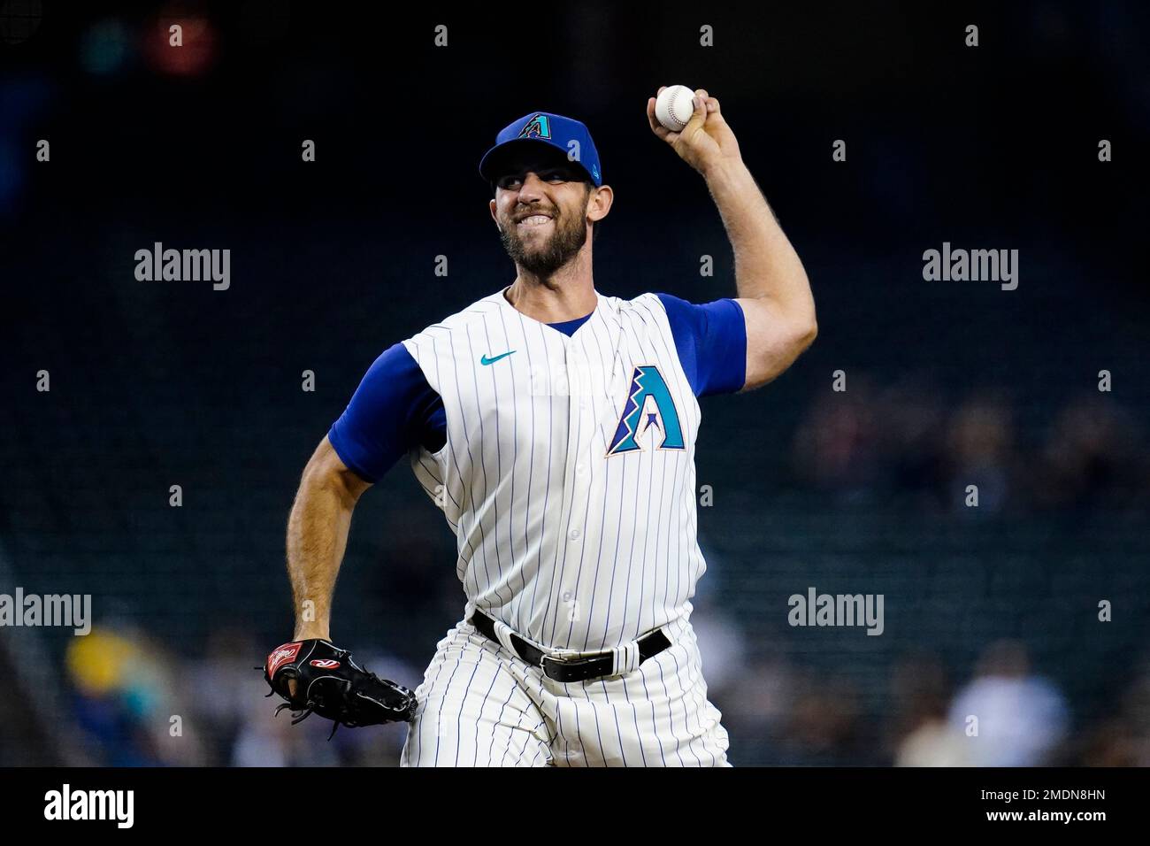 Arizona Diamondbacks starting pitcher Madison Bumgarner throws a pitch ...