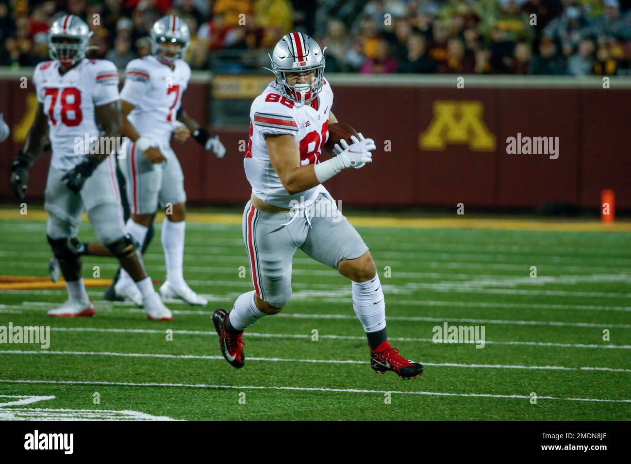 Ohio State tight end Jeremy Ruckert (88) catches a pass and runs ...