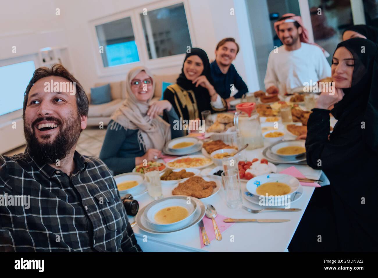 Eid Mubarak Muslim family having Iftar dinner taking pictures with ...