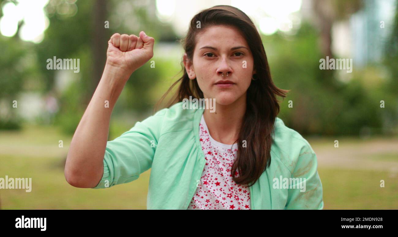 Woman raising hand. Powerful woman lifting fist symbol Stock Photo - Alamy