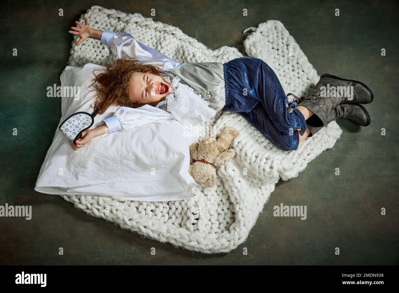 Happy morning, excited wake up. Ariel view of cute little girl in ...