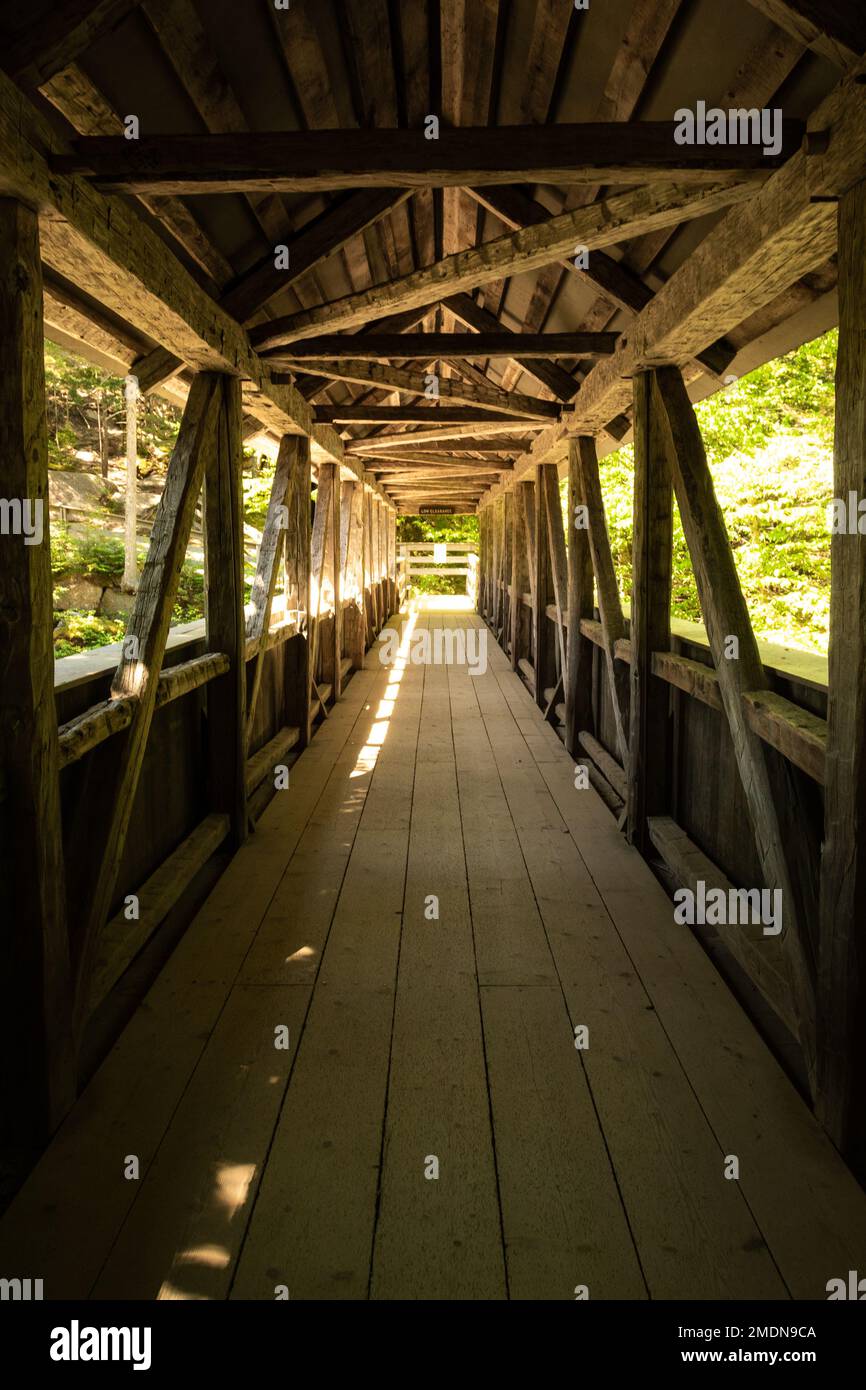 The Flume Gorge wooden Sentinel Pine Bridge at base of Mount Liberty in ...