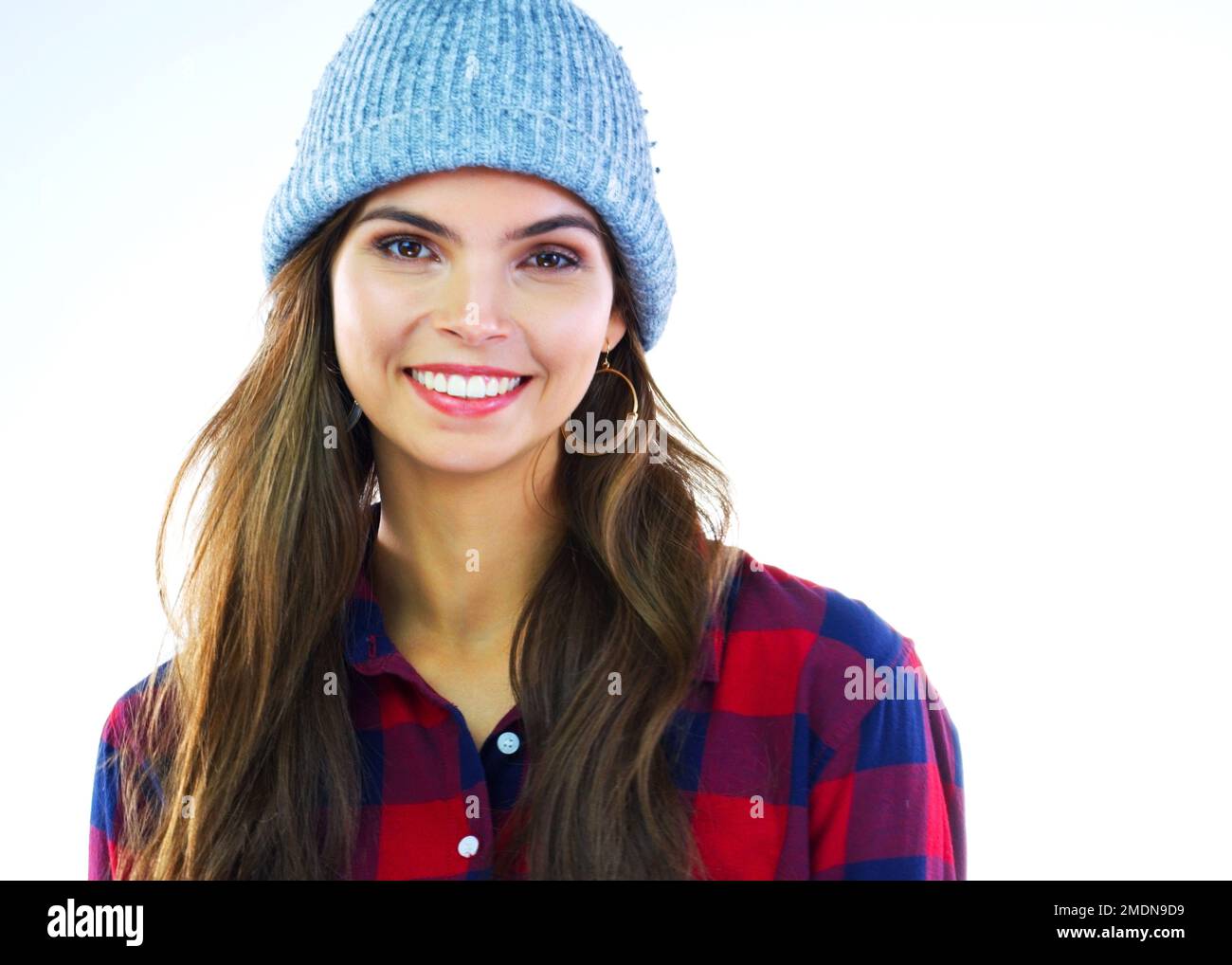 Smile, and let the world wonder why. Portrait of a young woman posing ...