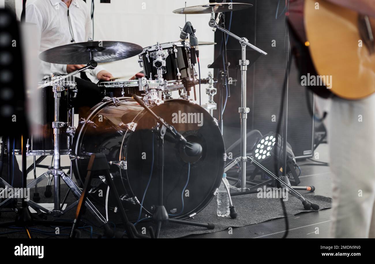 Playing drums on stage. music, instruments concept Stock Photo - Alamy