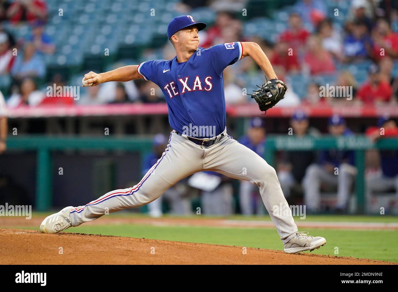Texas Rangers starting pitcher Glenn Otto (49) throws during the first ...