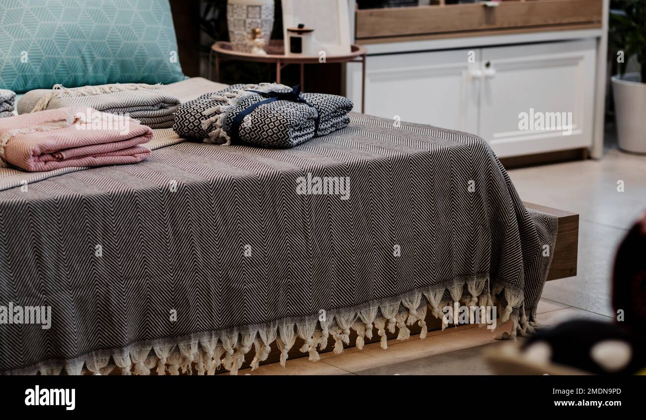 Modern style bedding on bed in bedroom, interior design detail Stock ...