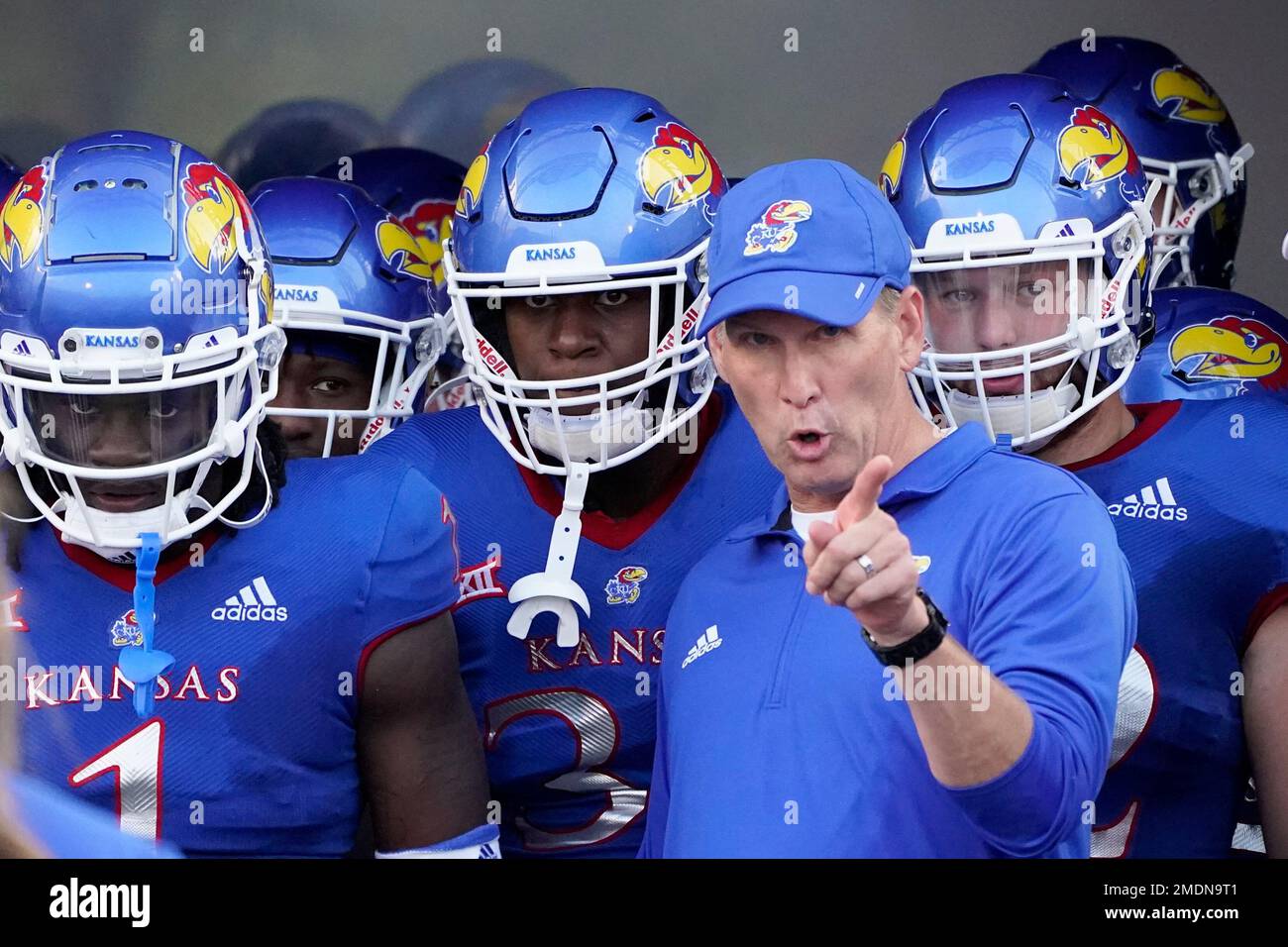 Kansas head coach Lance Leipold talks to his players before an NCAA ...
