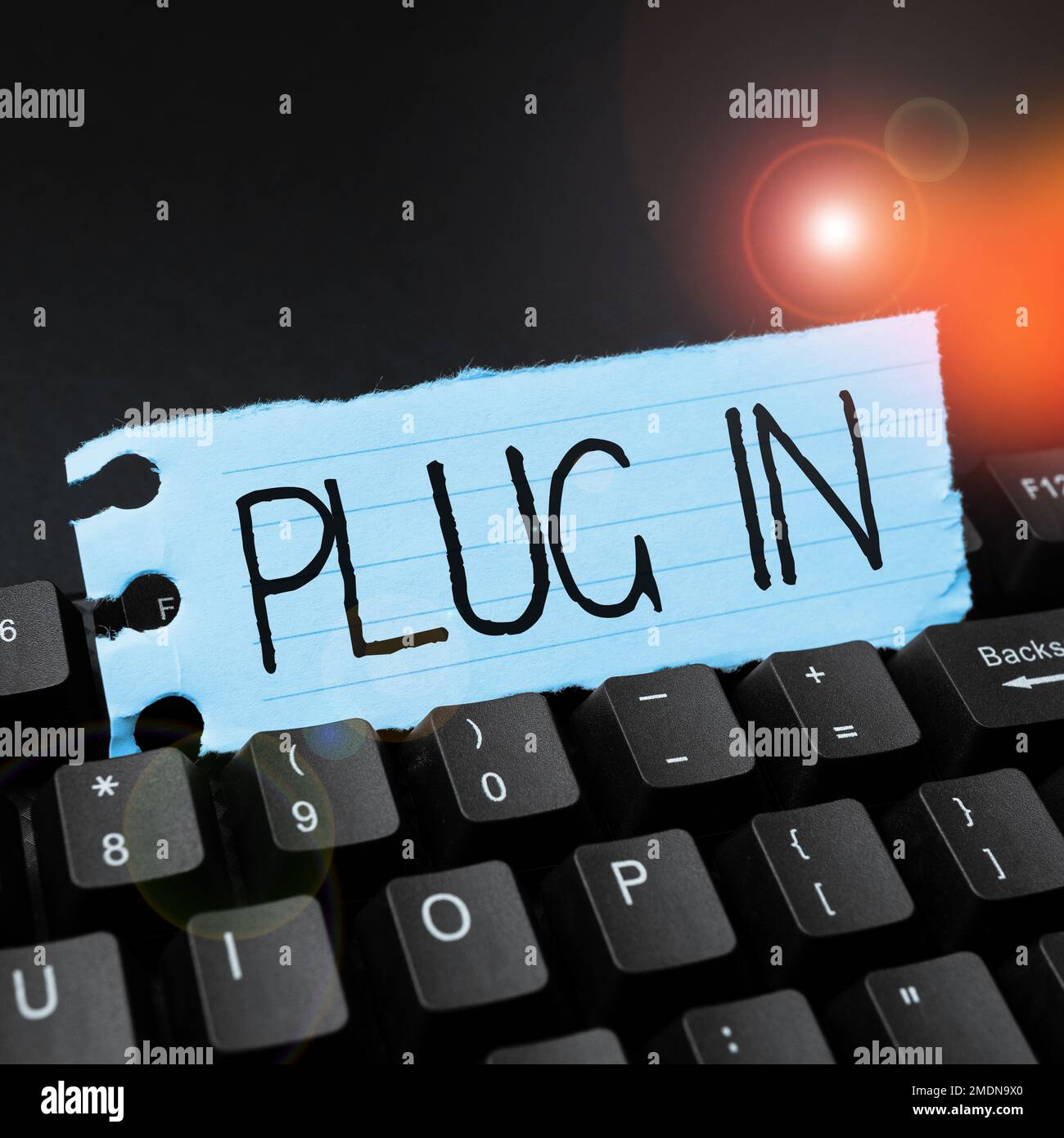 Sign displaying Plug In. Conceptual photo putting device into ...