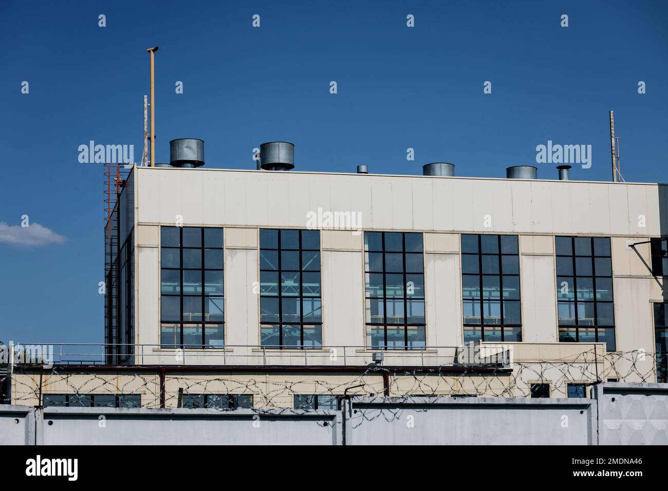 Details of facade made of panels with windows on industrial building ...
