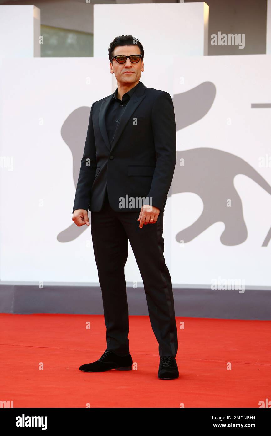 Oscar Isaac poses for photographers upon arrival at the premiere of the ...