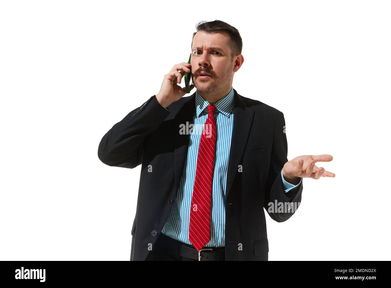 Businessman in a suit talking on phone with questioning face over white ...