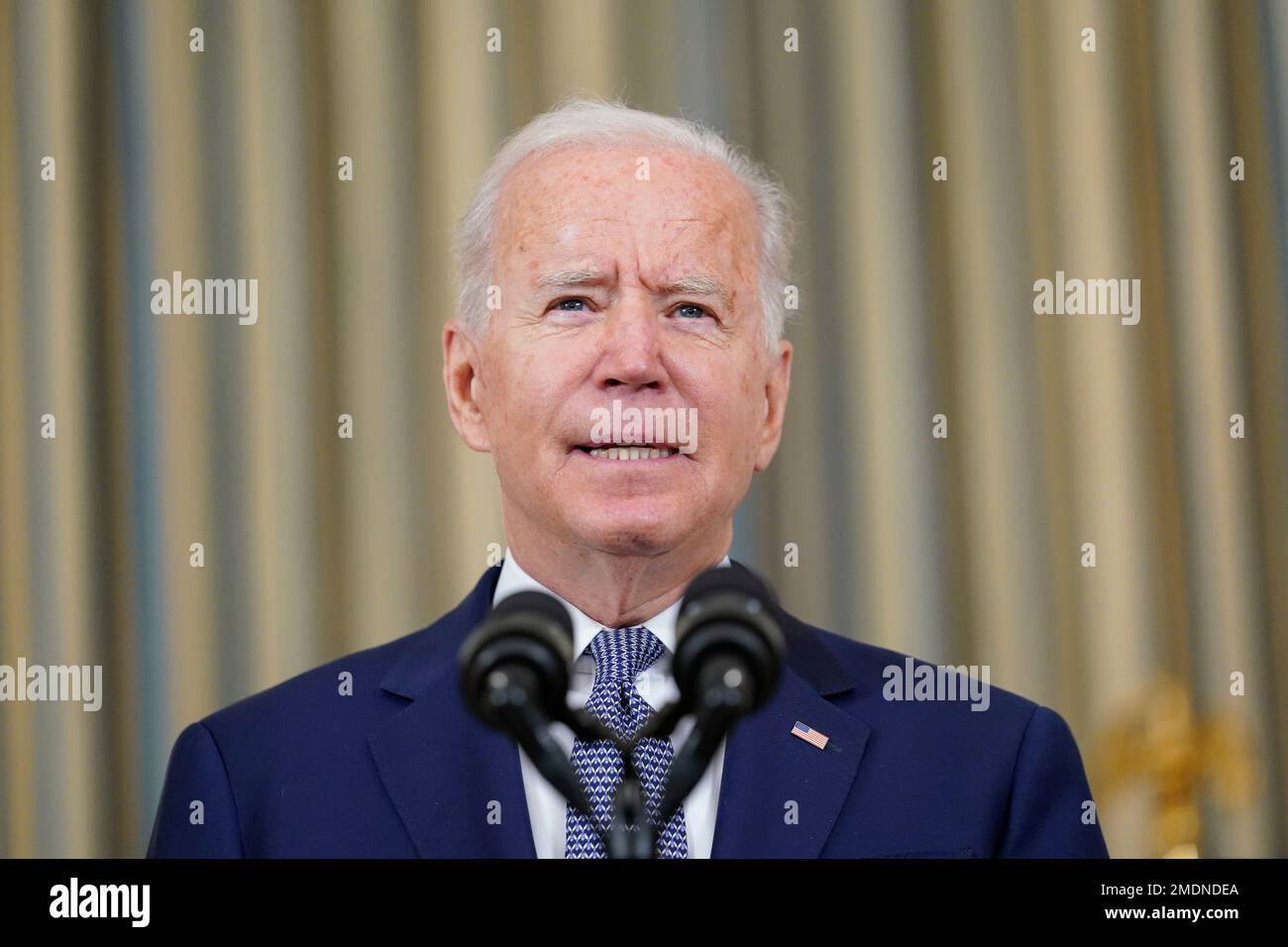 President Joe Biden speaks from the State Dining Room of the White ...