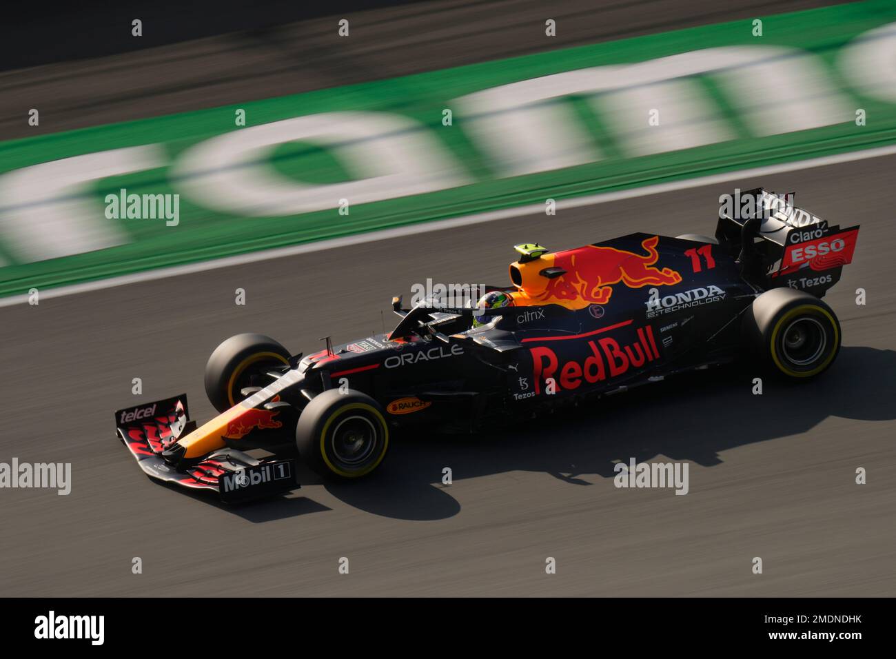 Red Bull driver Sergio Perez of Mexico steers his car during the second free practice ahead of ...