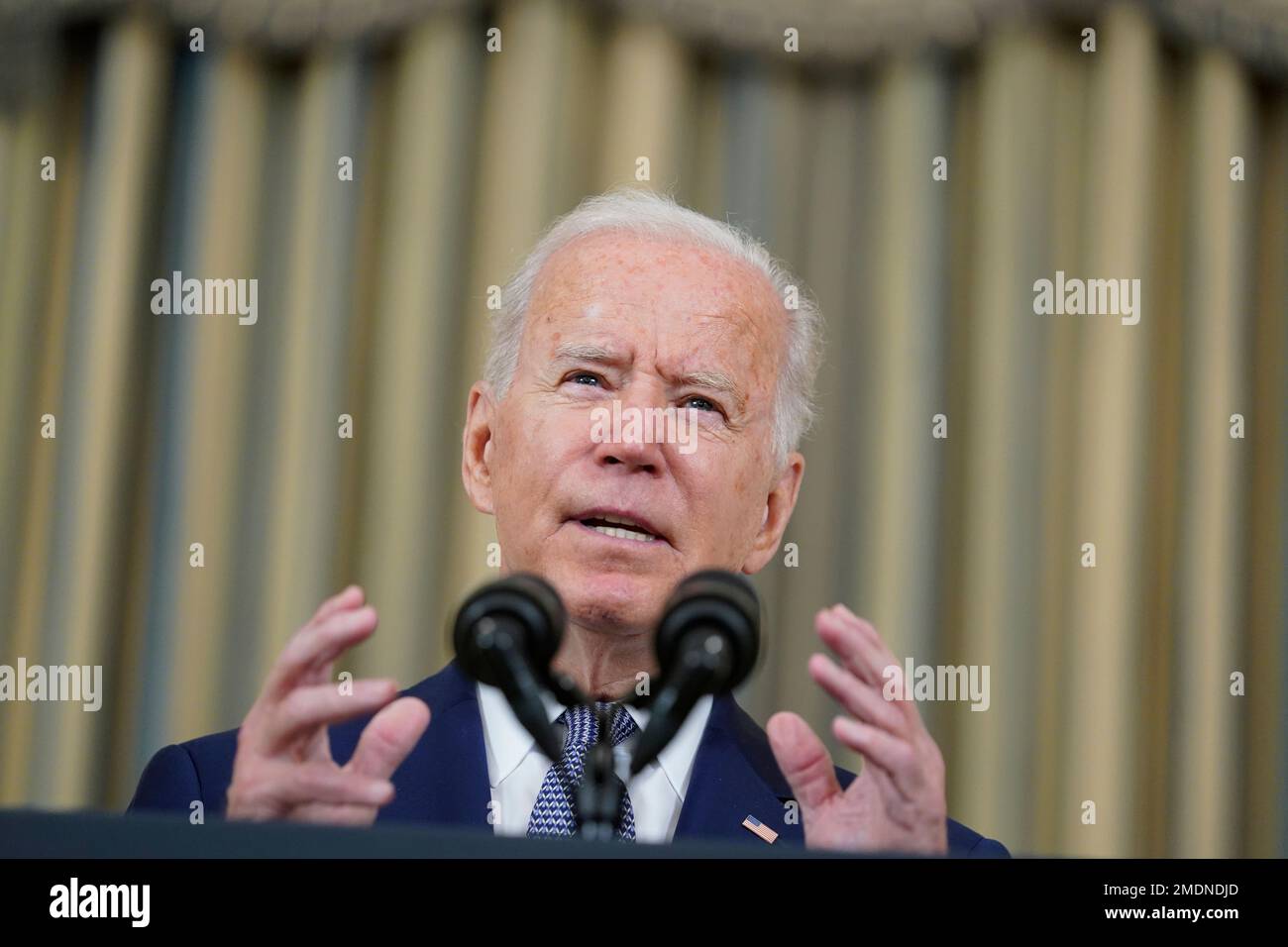 President Joe Biden speaks from the State Dining Room of the White ...