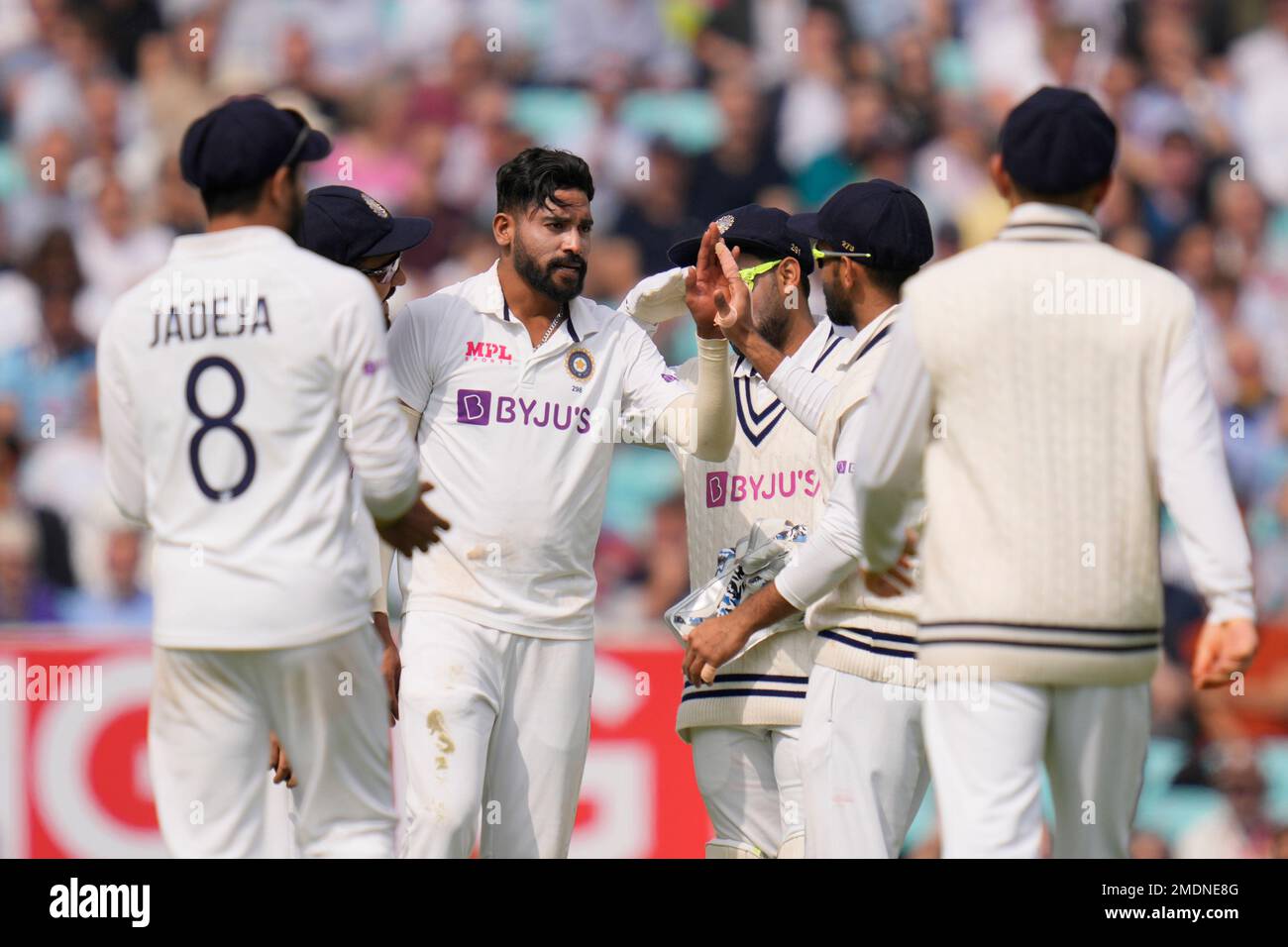 India's Mohammed Siraj celebrates taking the wicket of England's Jonny ...