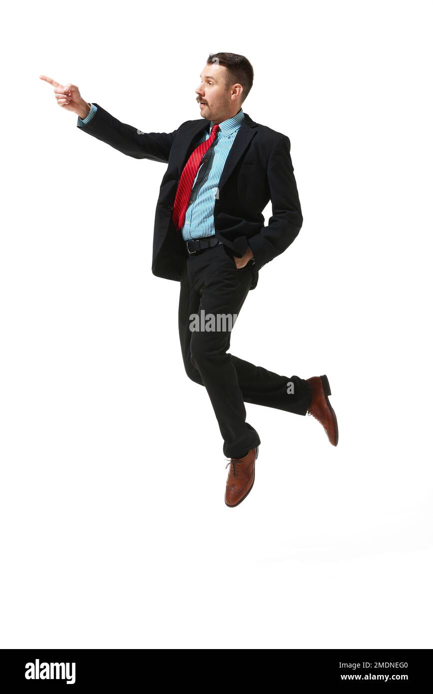 Businessman, office manager in a suit over white studio background ...