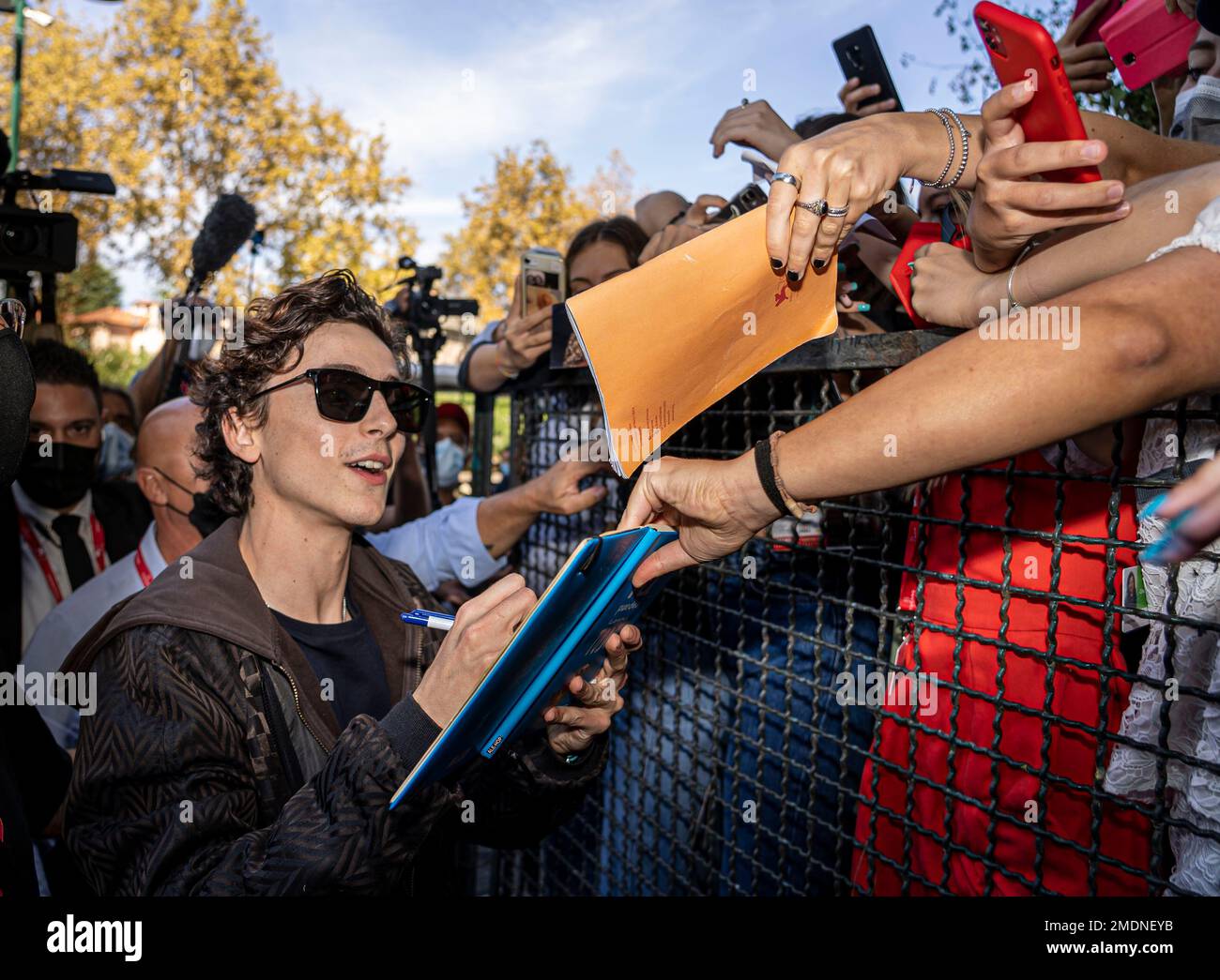 Actor Timothée Chalamet signs autographs upon arrival for the photo ...