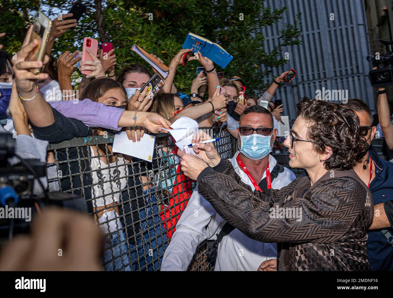 Actor Timothée Chalamet signs autographs upon arrival for the photo ...