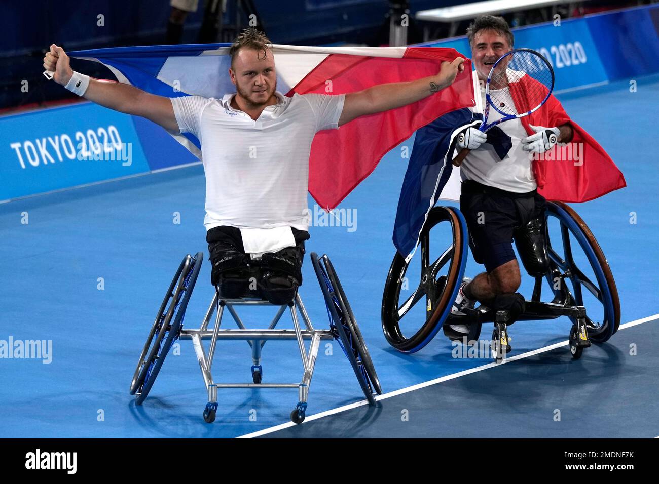 France's Stephane Houdet, right, and Nicolas Peifer, pose with the ...