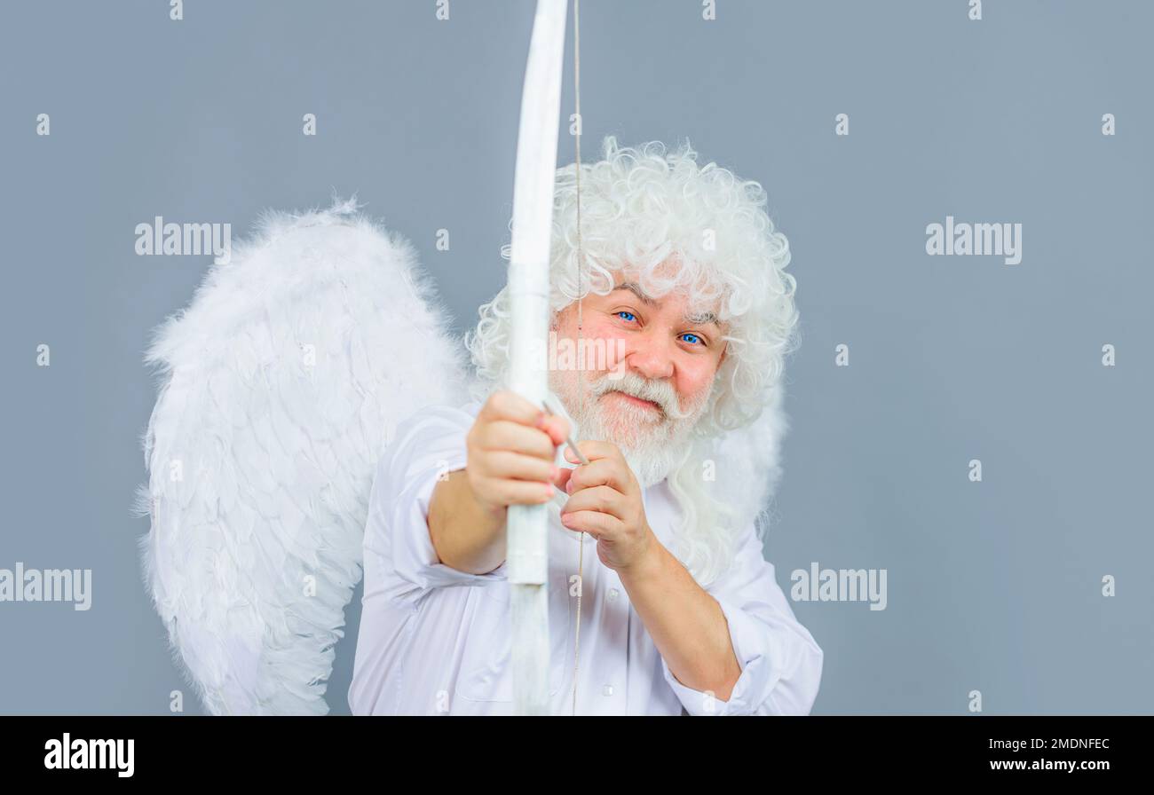 Valentines Day. Valentine cupid shooting arrow with bow. Bearded angel ...