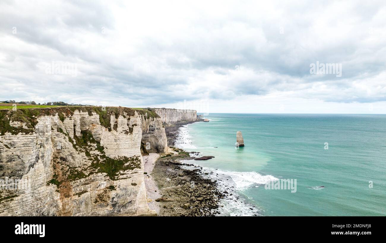 This image captures the rugged beauty of a steep coast in Normandy with ...