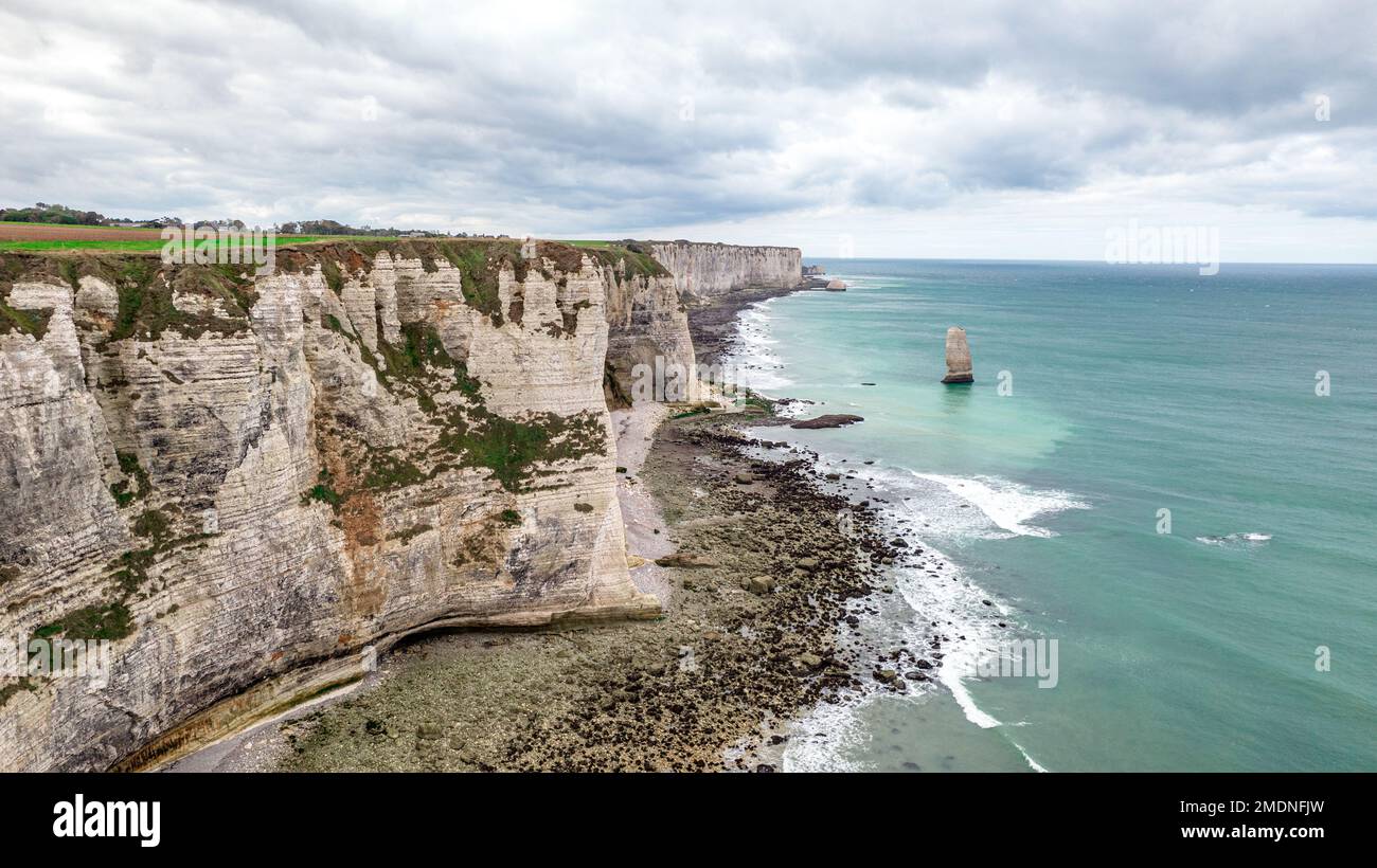 This image captures the rugged beauty of a steep coast in Normandy with ...