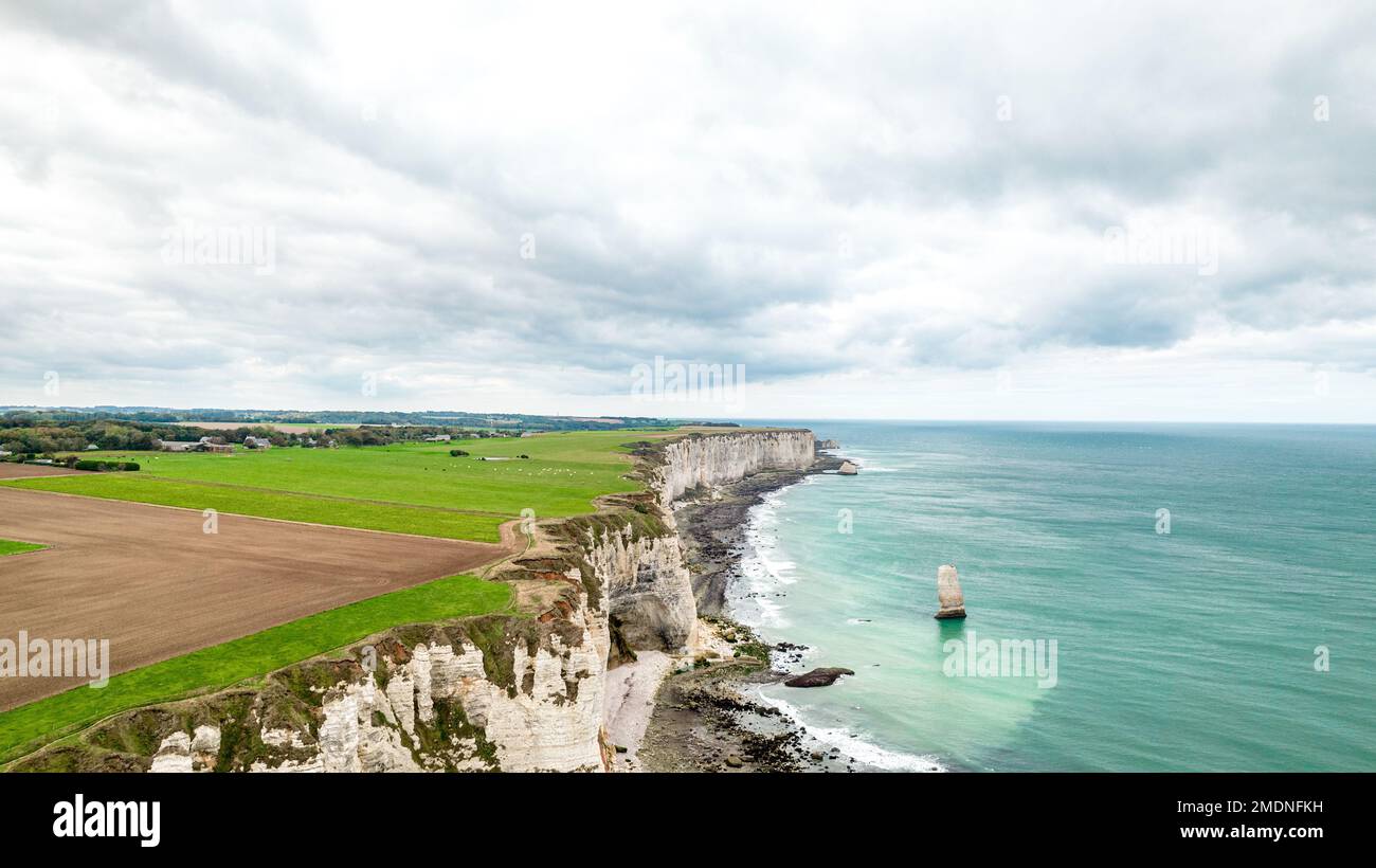 This image captures the rugged beauty of a steep coast in Normandy with ...