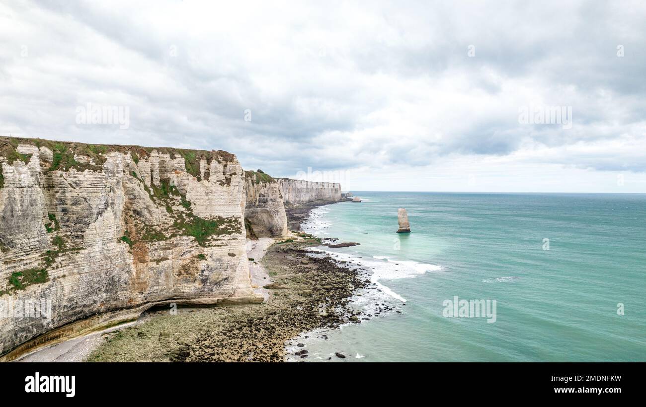 This image captures the rugged beauty of a steep coast in Normandy with ...