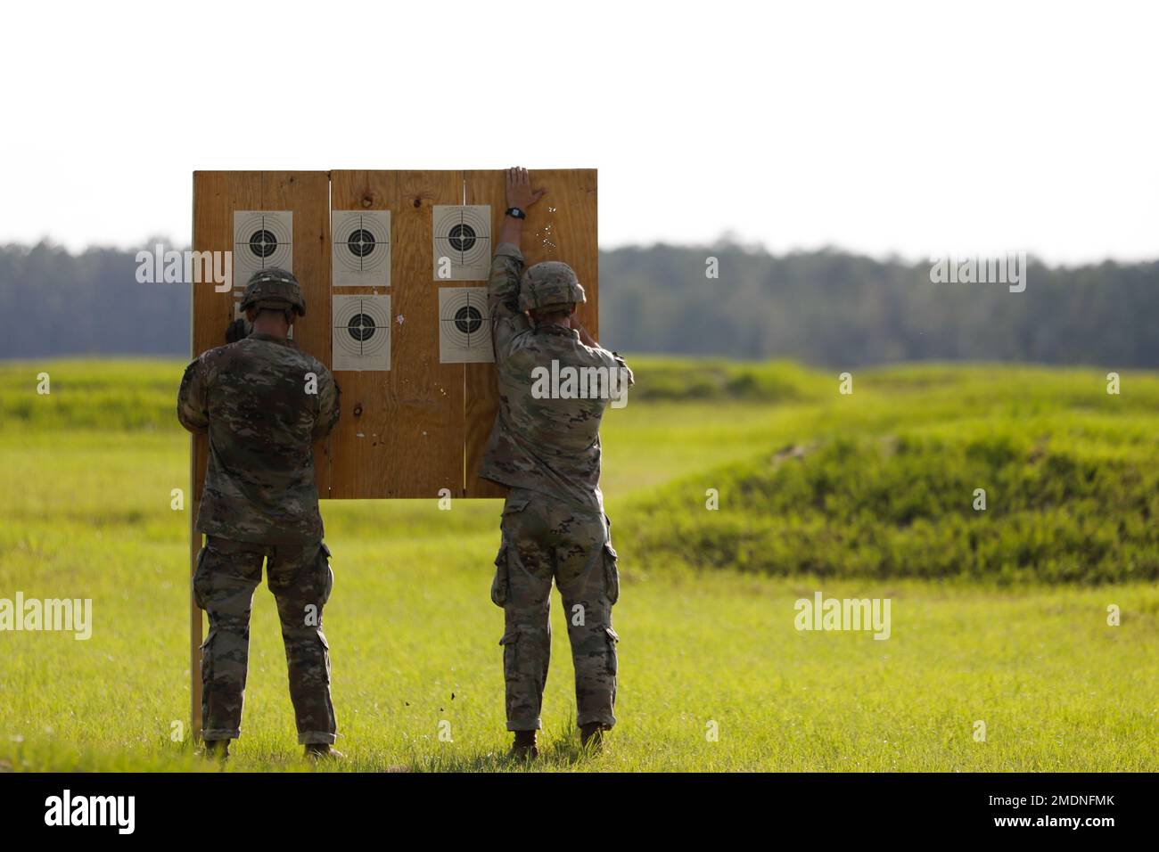 Spc. Robert Culler (Left) and Sgt. John Morris, both members of the ...