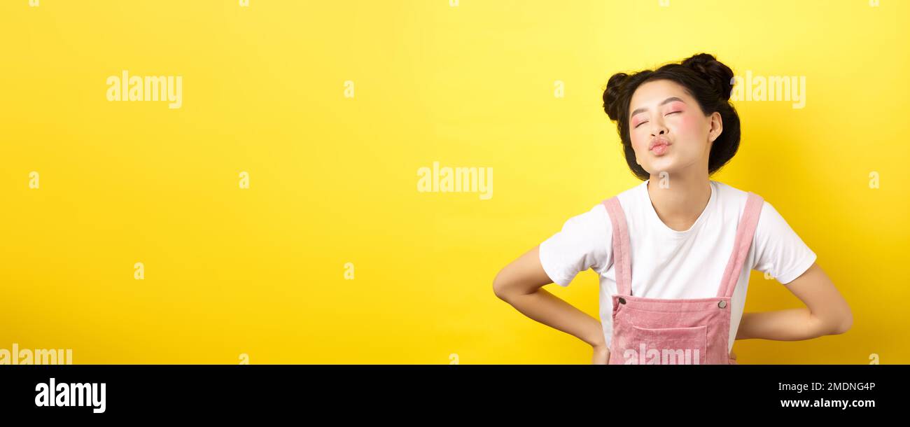 Romantic korean girl close eyes and pucker lips, waiting for sweet kiss ...