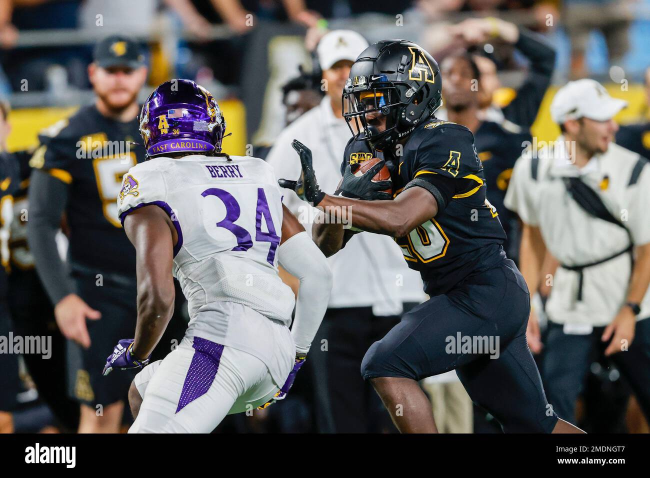 Appalachian State running back Nate Noel, right, carries the football ...